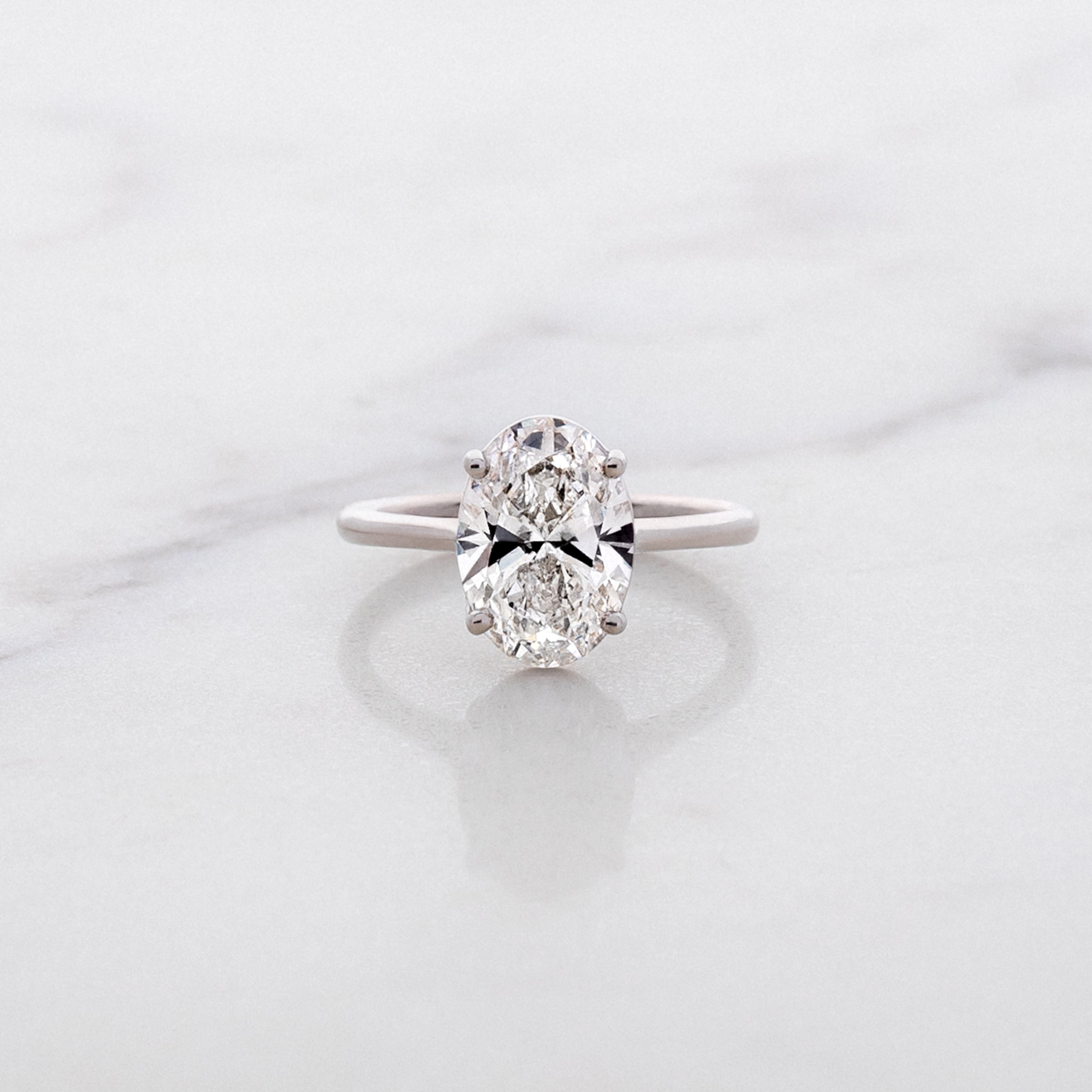 Rose Oval Solitaire – Jenni Stuart Fine Jewelry