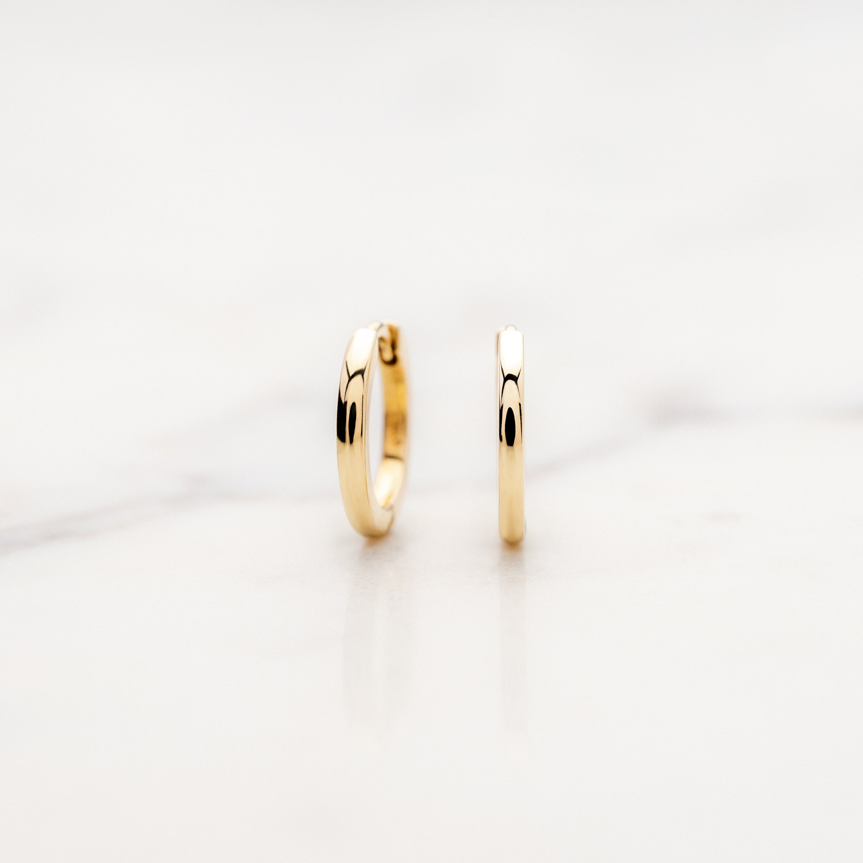 1.6mm Huggy Hoops – Jenni Stuart Fine Jewelry