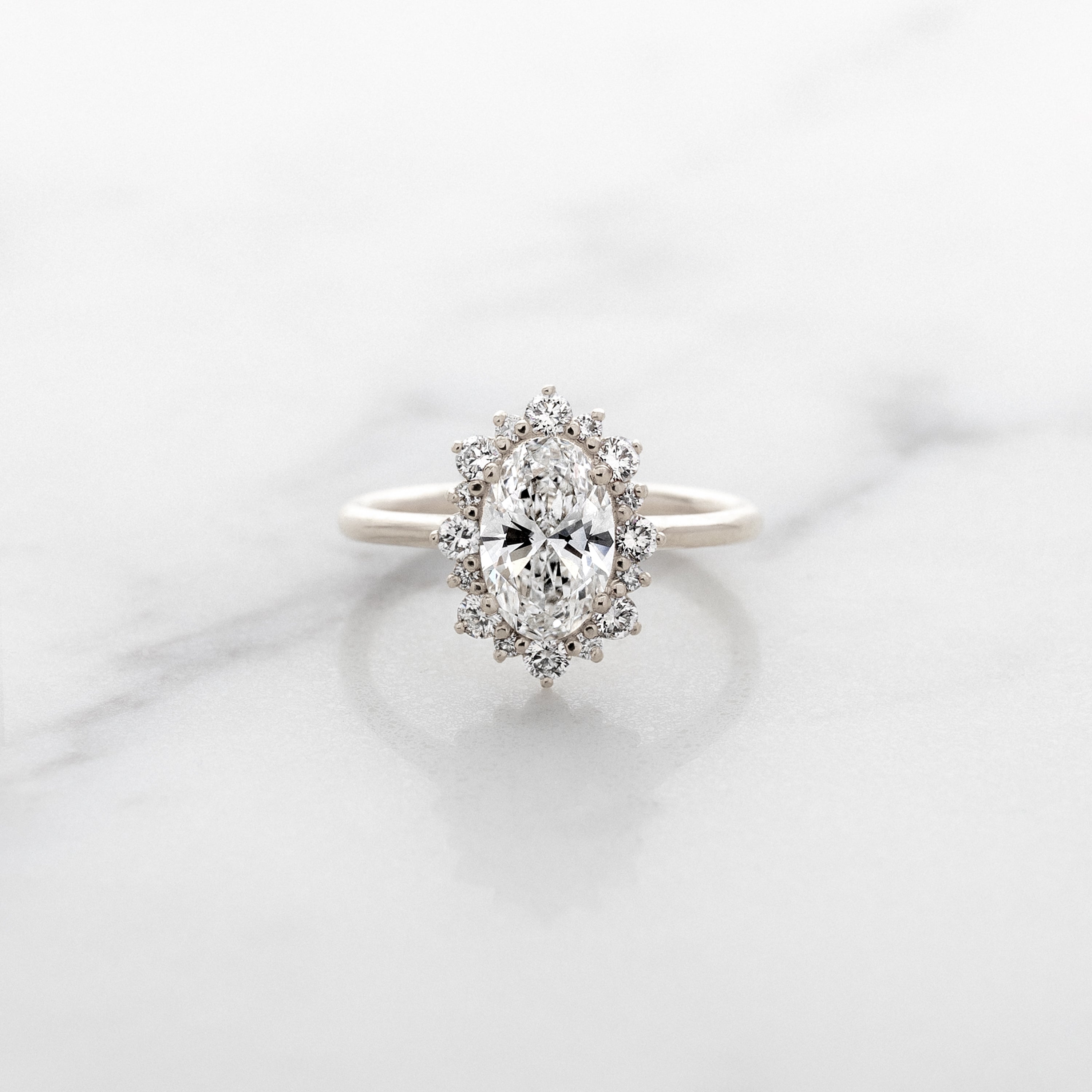 Violet Oval Halo Ring – Jenni Stuart Fine Jewelry